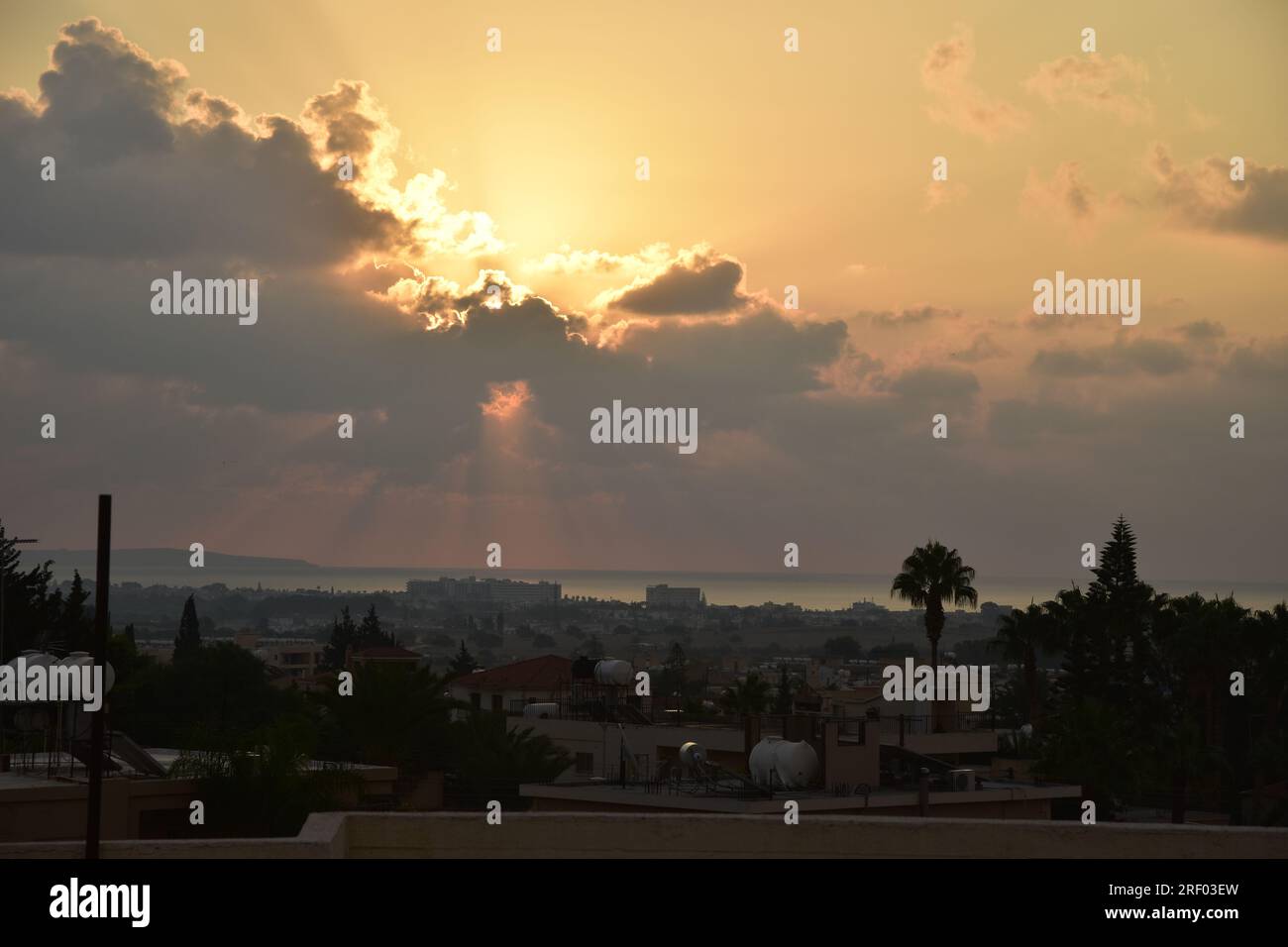 Storm clouds blot out the sun over Larnaca bay Cyprus Stock Photo - Alamy