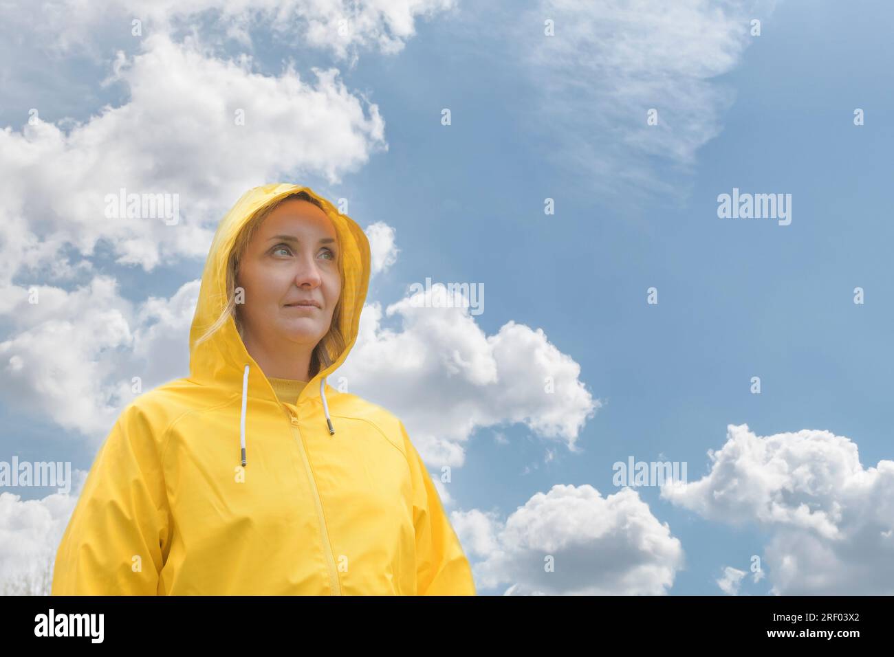 Portrait girl in yellow hood hi-res stock photography and images - Alamy