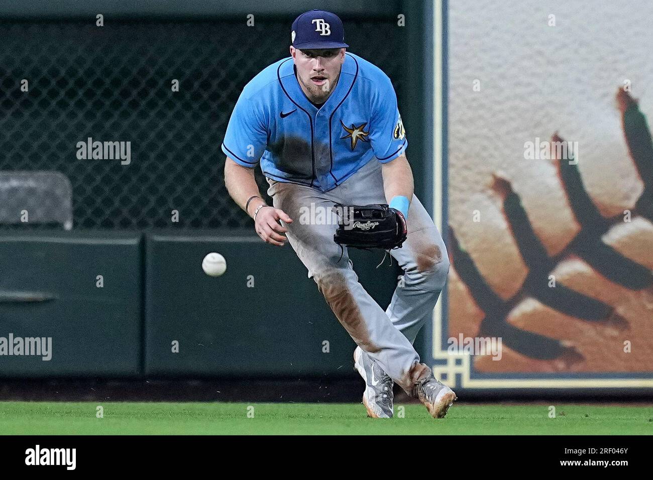 Tampa Bay Rays left fielder Luke Raley fields a base hit by Houston ...