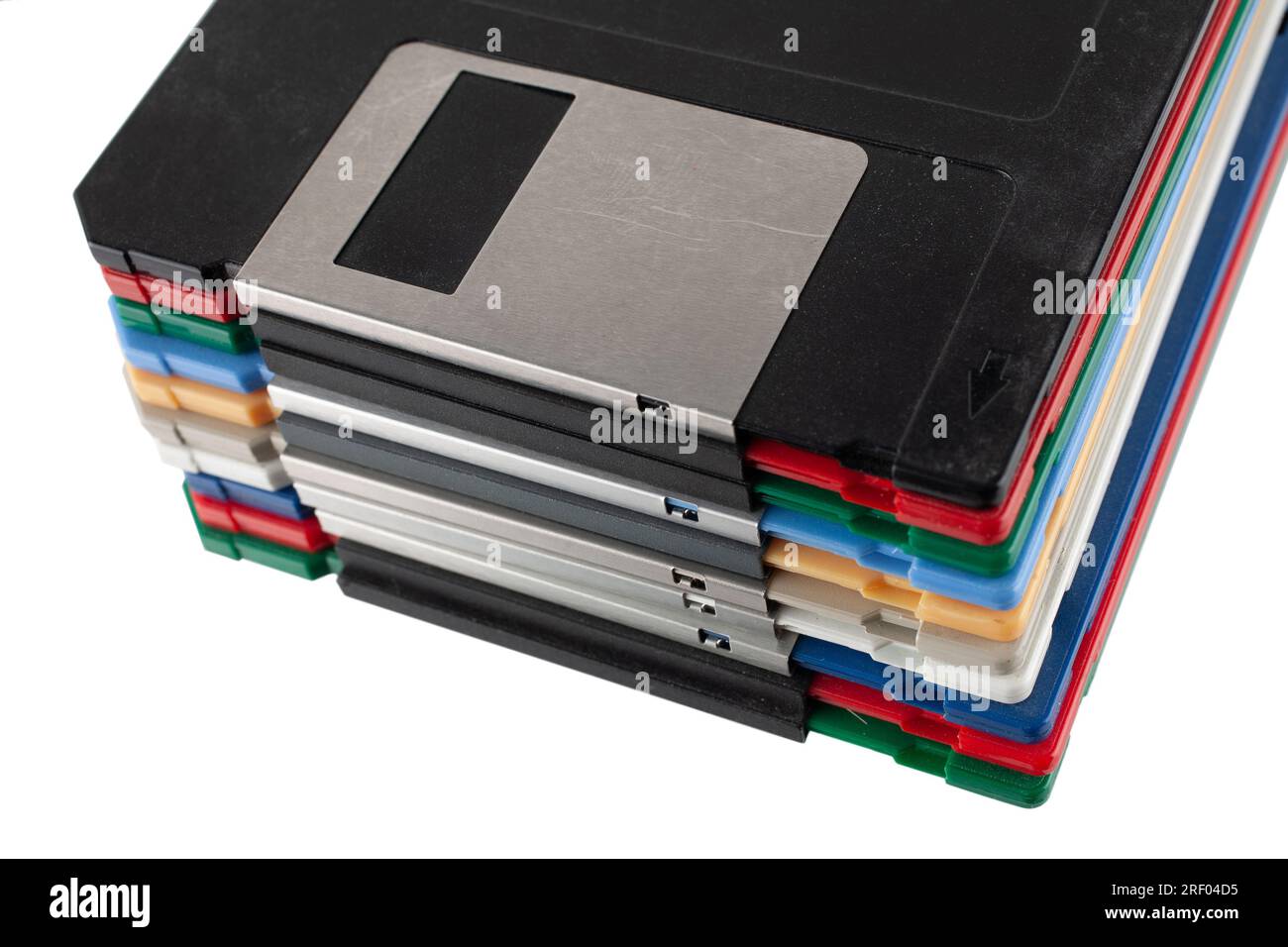 Colored old retro floppy diskettes in stack. Isolated on white ...