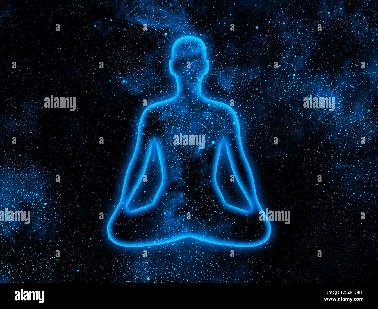 Cosmic radiant man in the lotus pose on a background of blue starry ...