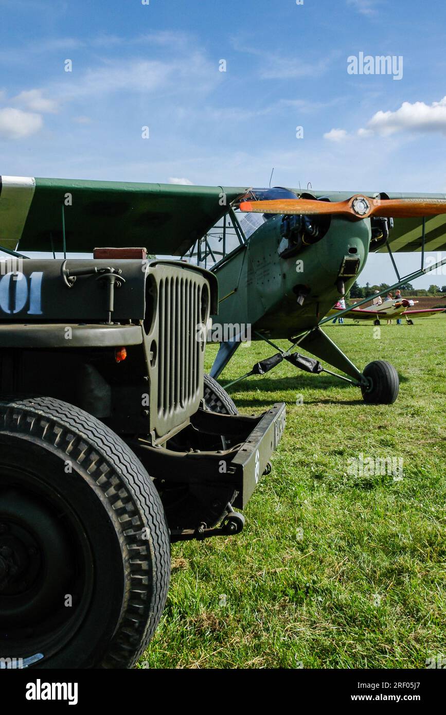 D-Day wartime Piper Cub plane with US Willys Jeep. Willys MB wartime ...