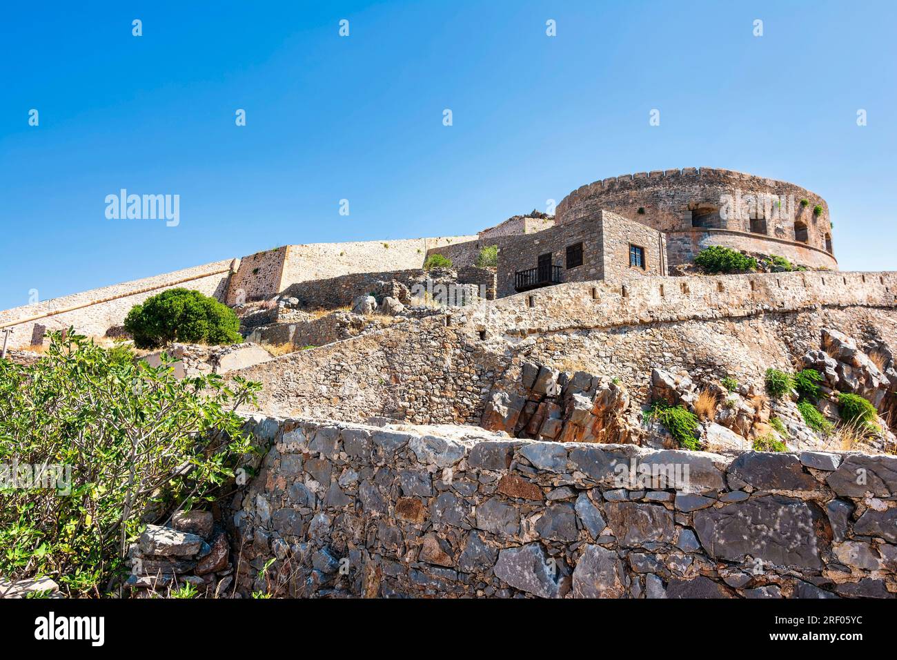 Round tower of Spinalonga fortress. Crete, Greece. Until 1957 used as a ...