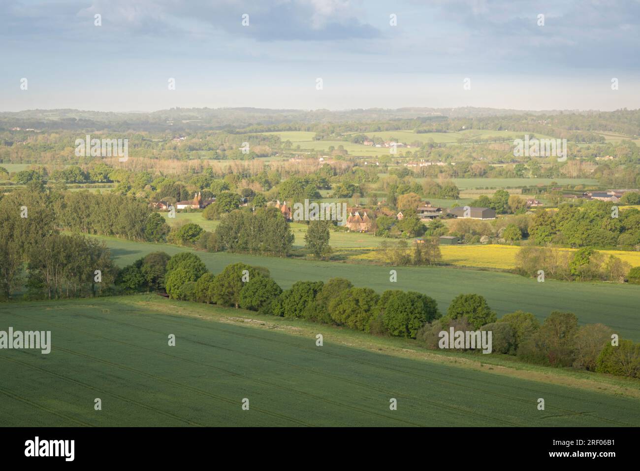 Aerial view of the fields and villages in the countryside in Kent, UK ...