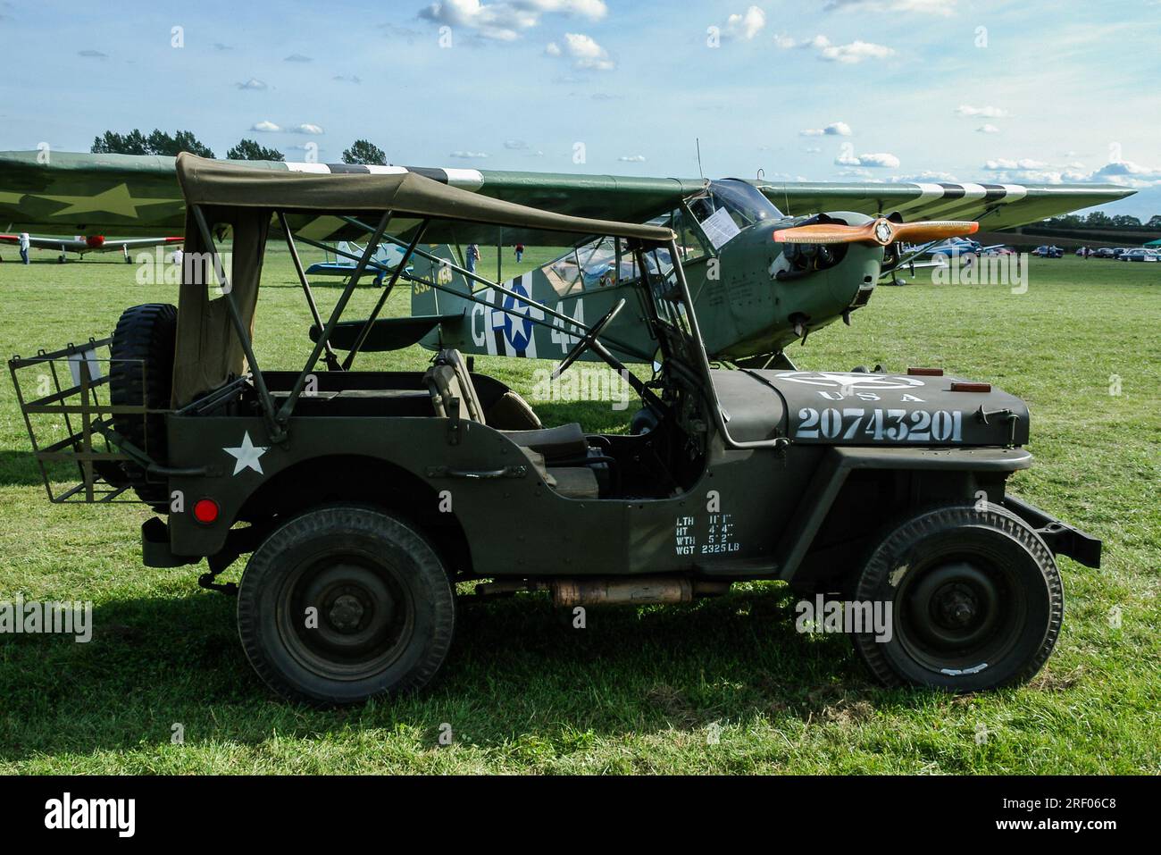 D-Day wartime Piper Cub plane with US Willys Jeep. Willys MB wartime ...