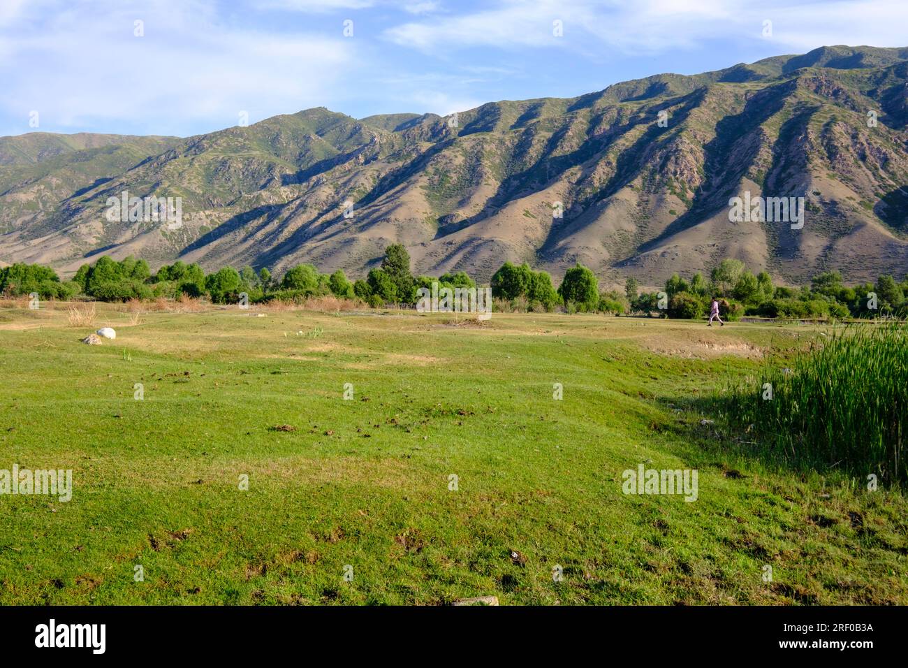 Kazakhstan, Saty Village Landscape, Hills in Early morning sunlight ...