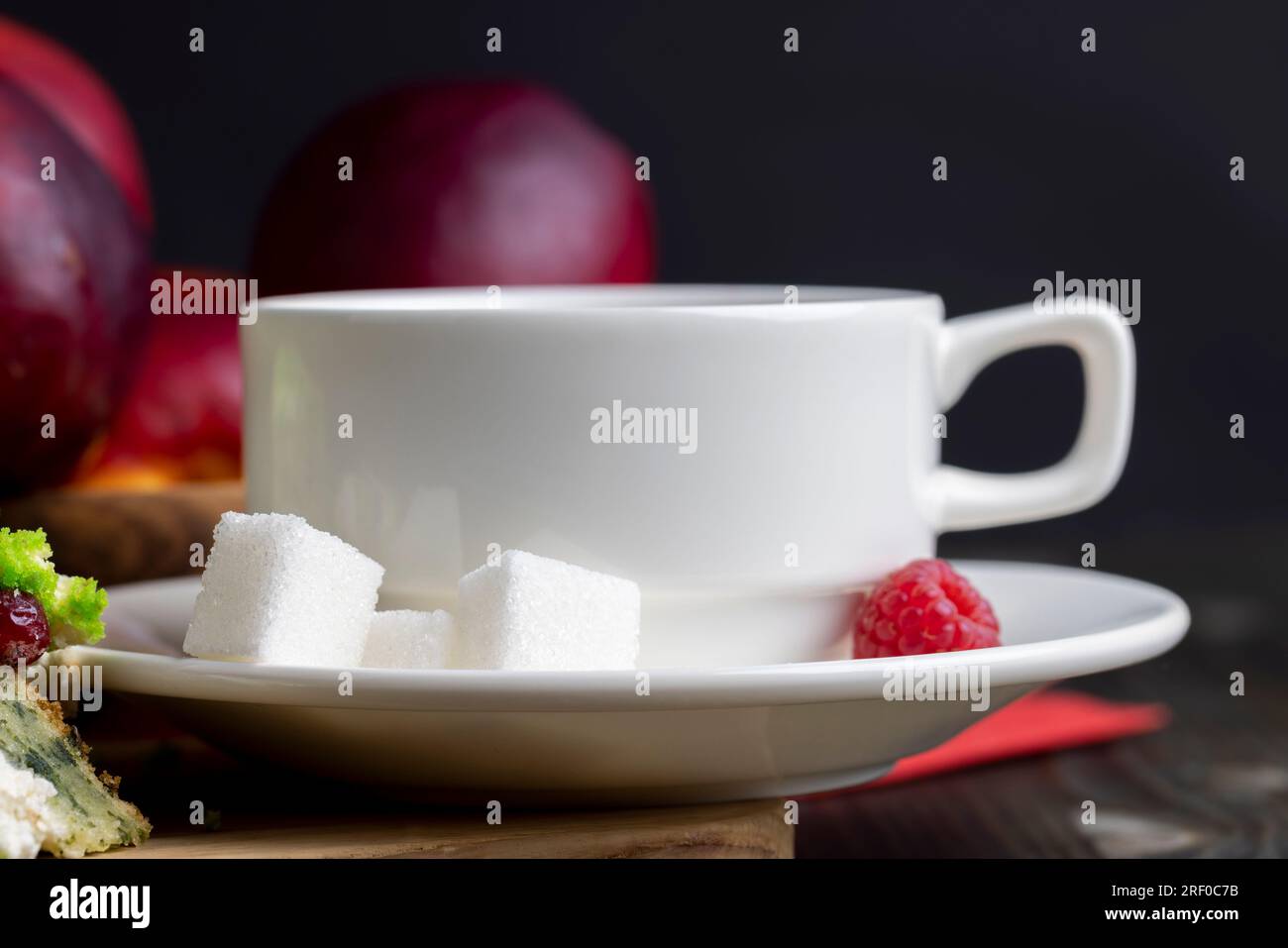 Red raspberry tea with pieces of fruit and berries, pieces of fruit ...