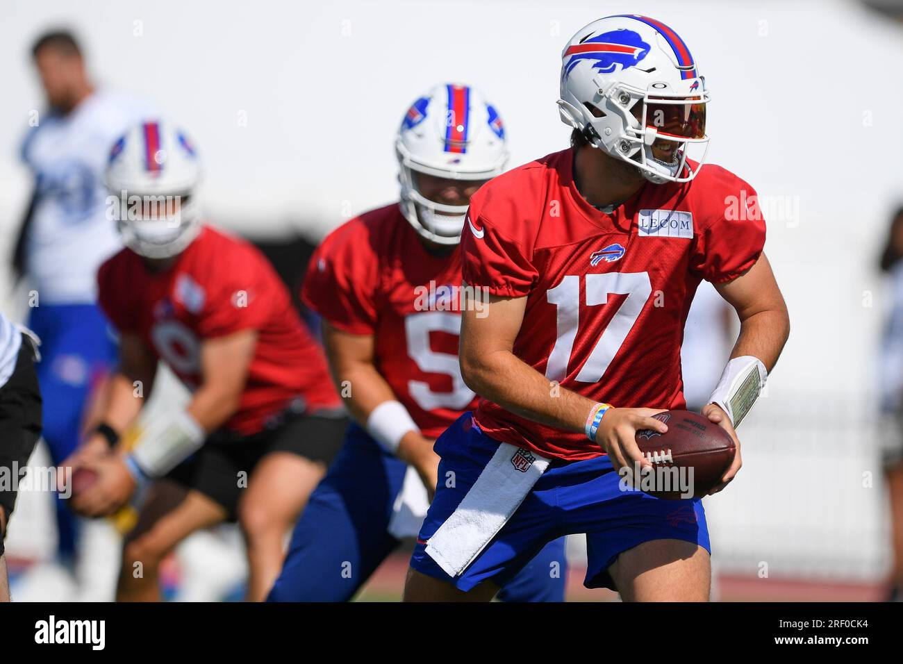 Buffalo Bills quarterback Josh Allen, right, runs a drill with Kyle ...