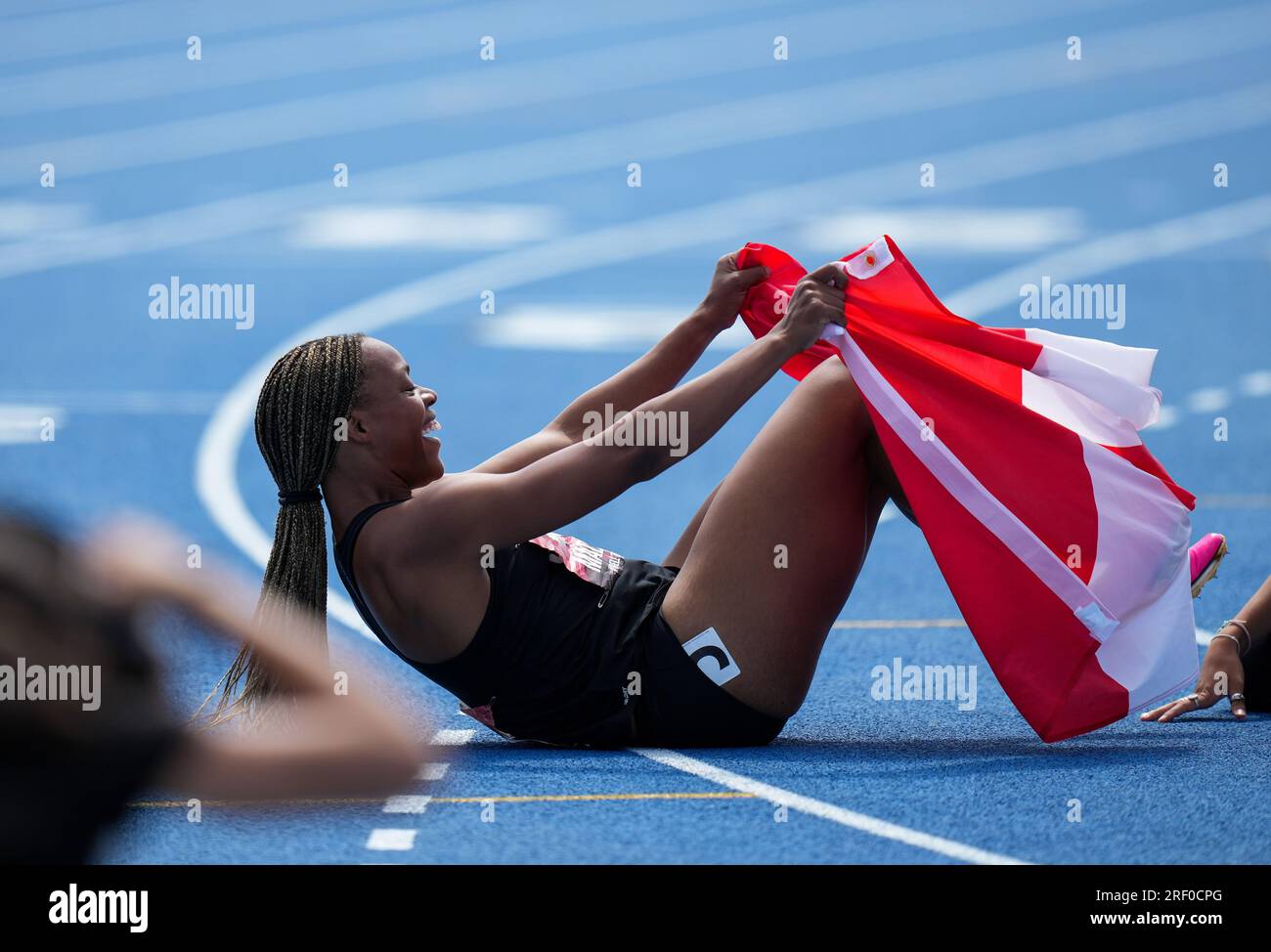 Langley, Canada. 30th July, 2023. Jacqueline Madogo, of Ottawa, holds a ...