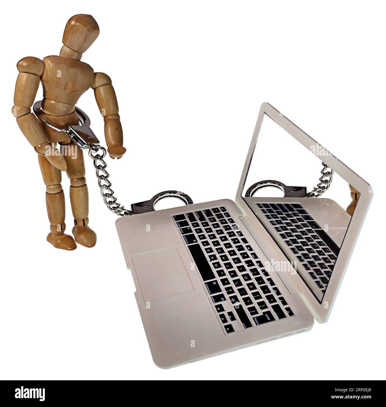 Locked to his Laptop with handcuffs Stock Photo - Alamy