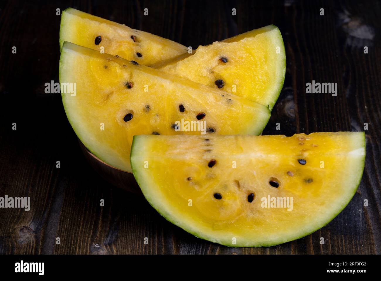 Sliced ripe yellow watermelon, ready to eat yellow watermelon pulp ...
