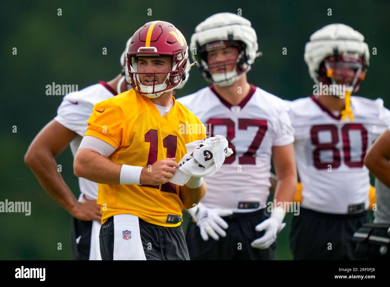 Washington Commanders quarterback Jake Fromm (11) works during a NFL ...