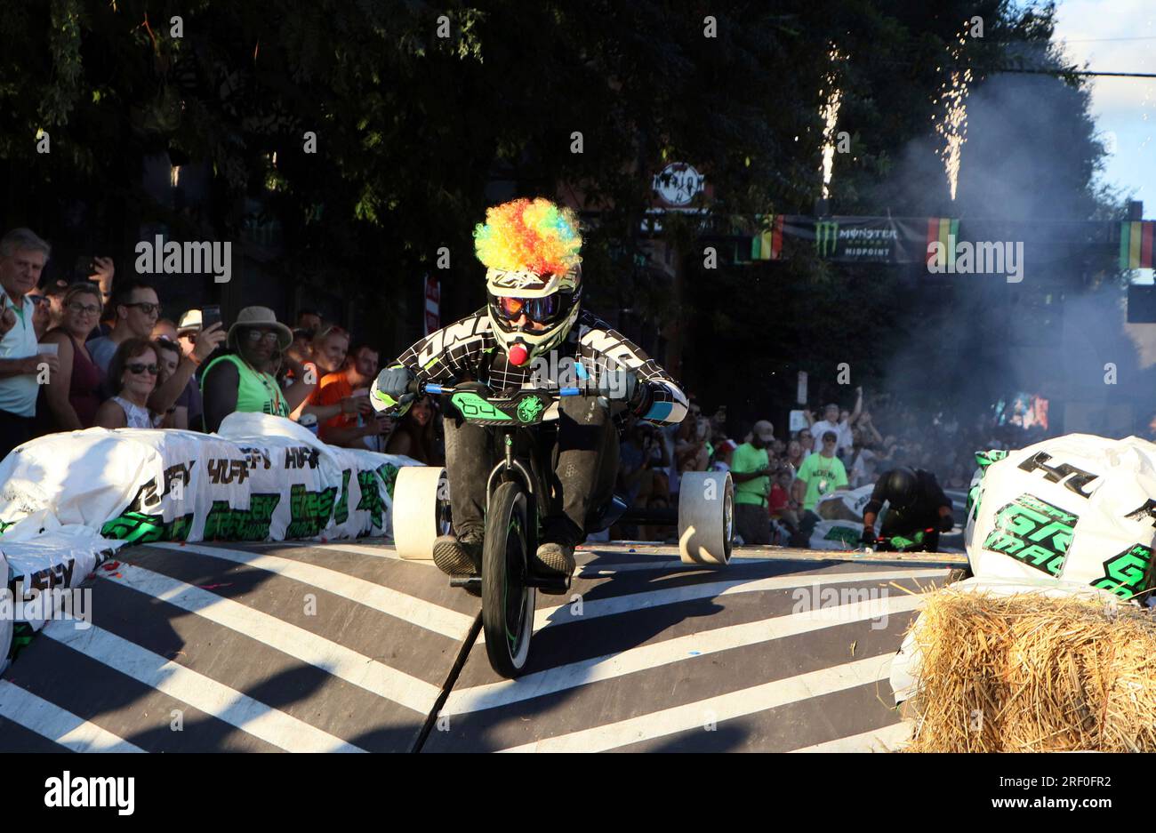 IMAGE DISTRIBUTED FOR HUFFY BICYCLES - Costumed riders battle ramps ...