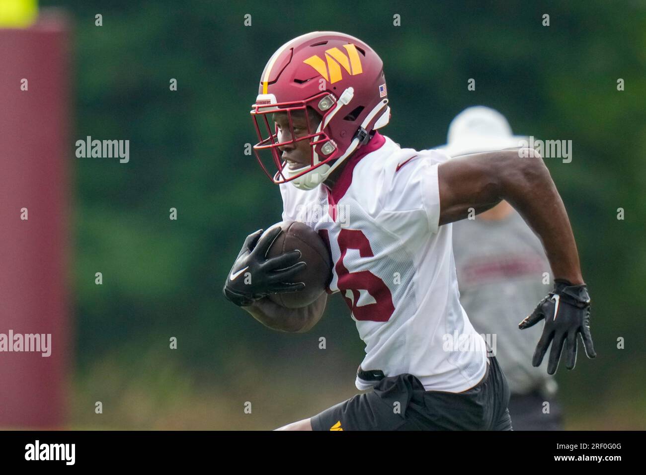 Washington Commanders wide receiver Byron Pringle runs with the ball ...