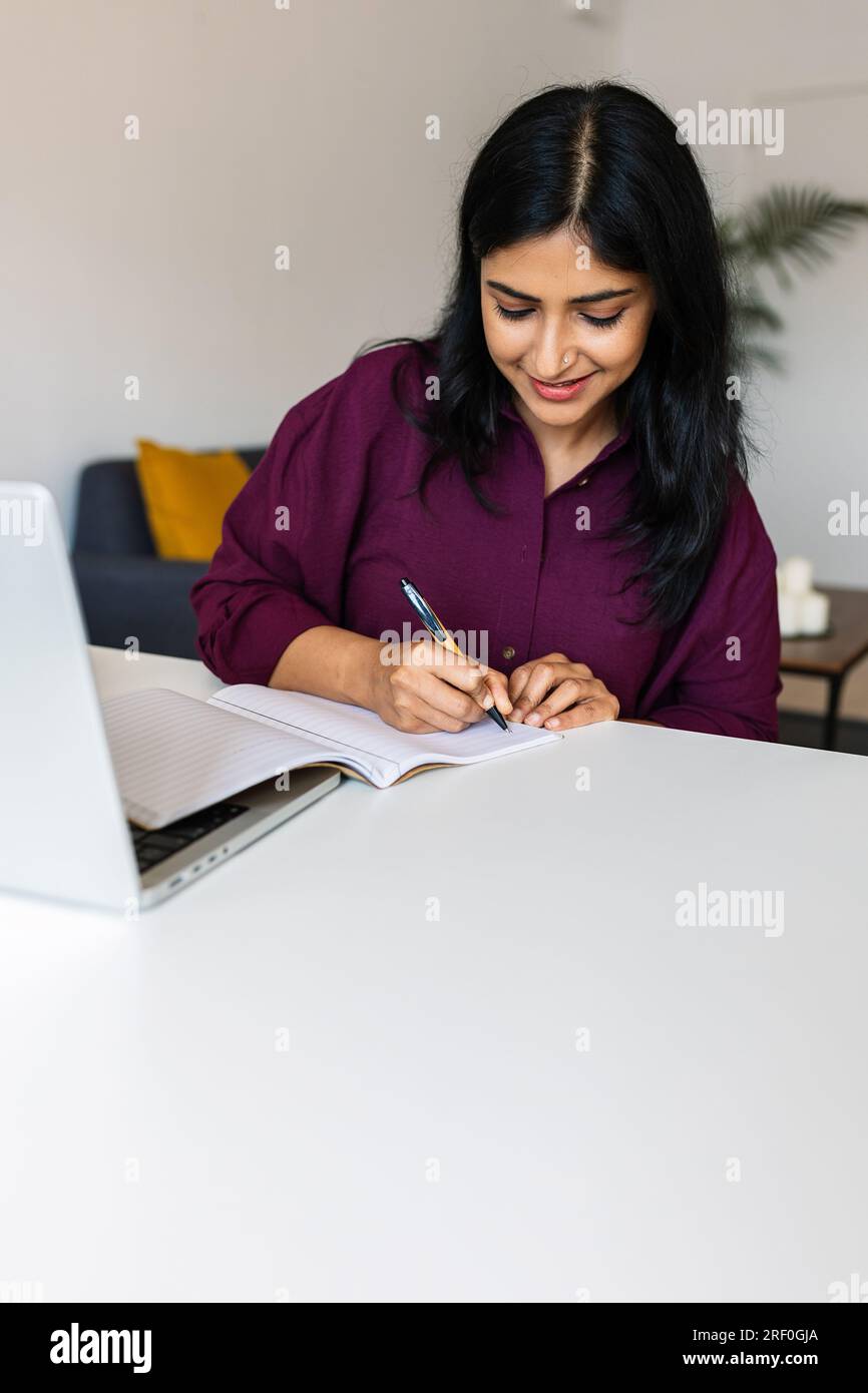 Indian female student studying home hi-res stock photography and images ...