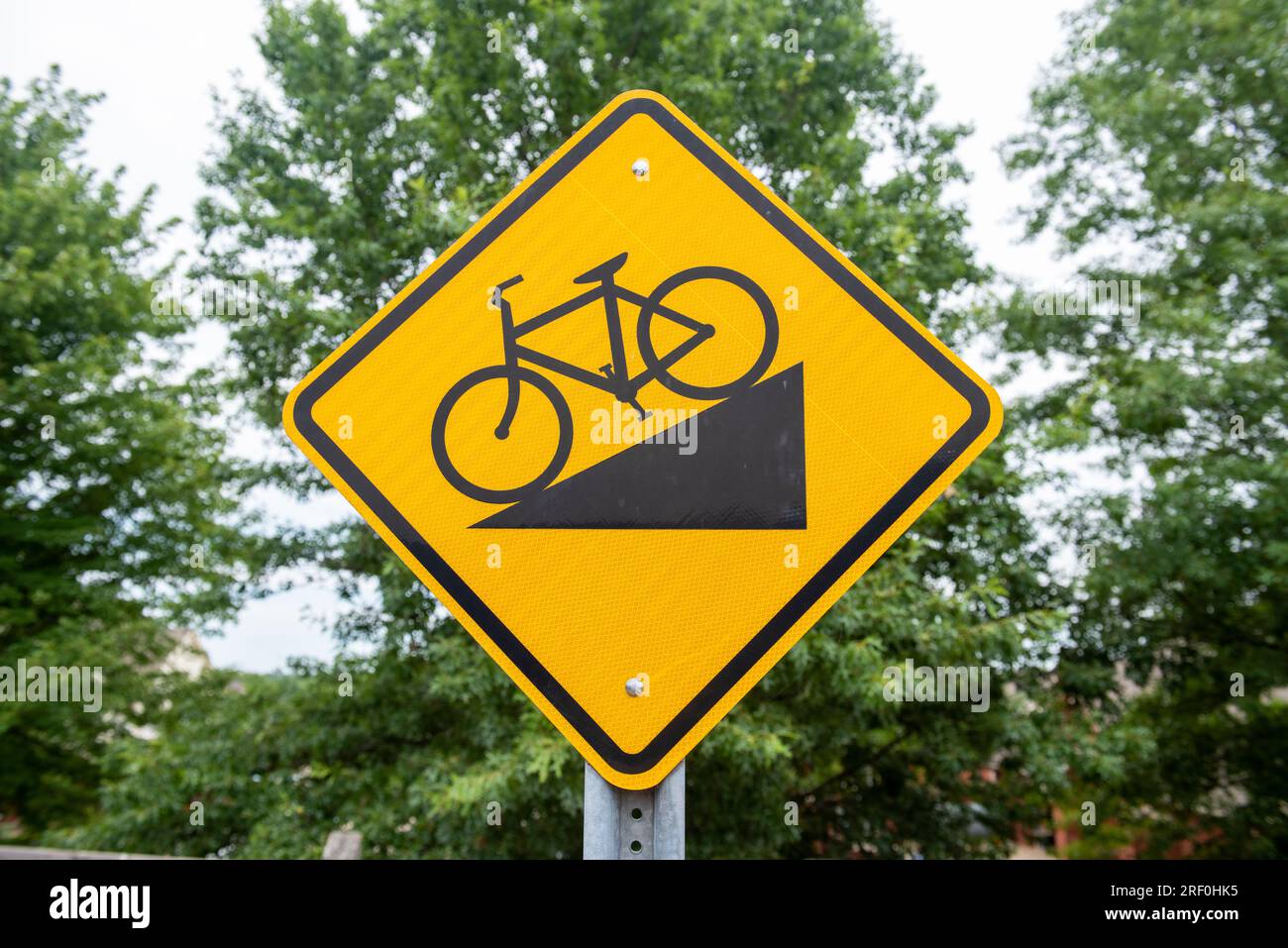 A sign for cyclists on the Razorback Greenway in Rogers, Arkansas ...