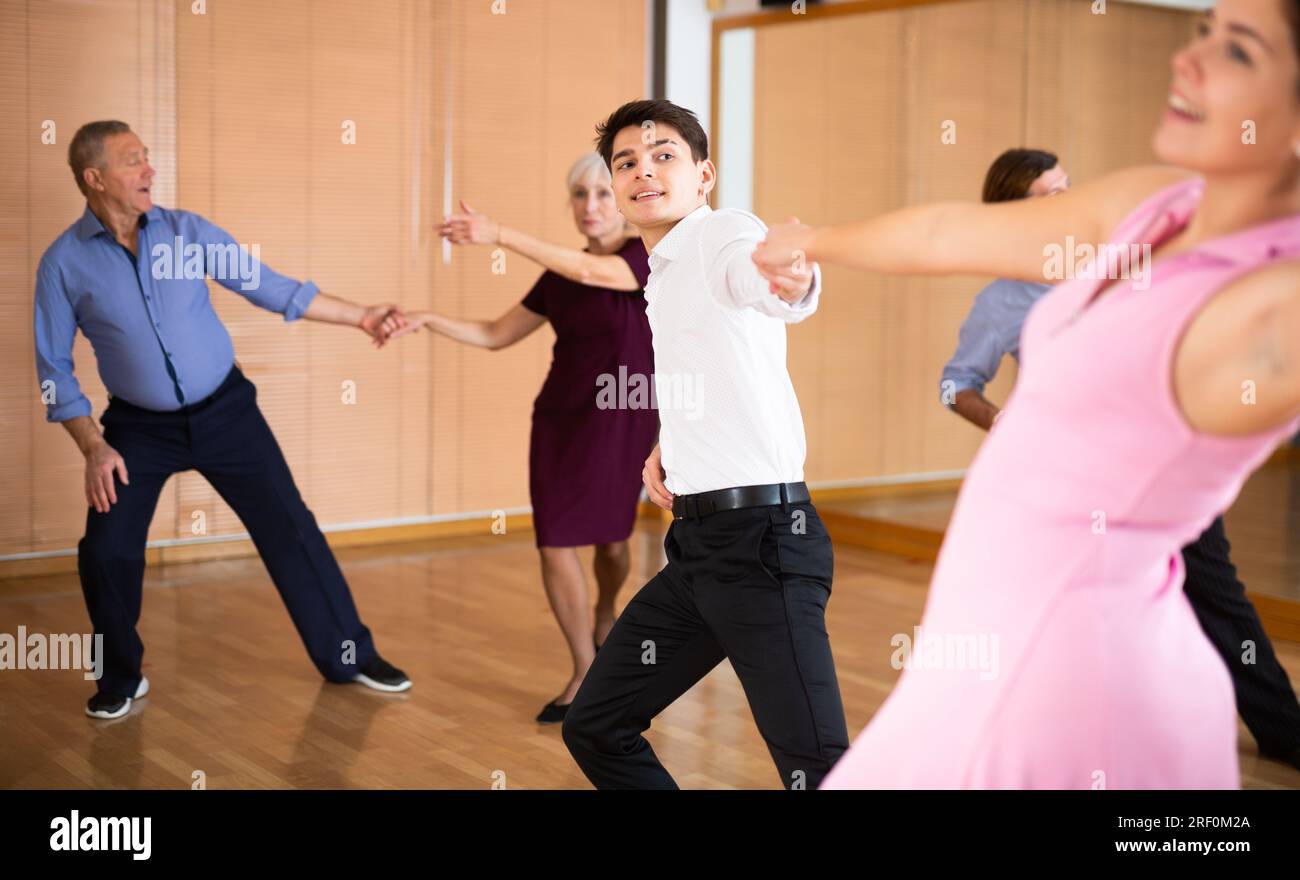 Guy dancing jive with female partner in dance studio Stock Photo - Alamy