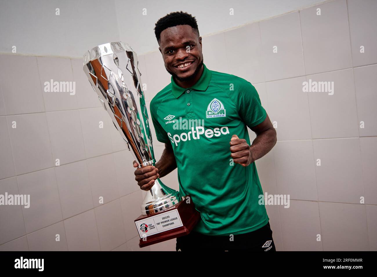 Nairobi, Kenya. 25 Jun 2023. Benson OMALLA (FW, Gor Mahia) with the 2022-23 KPL winners trophy ...