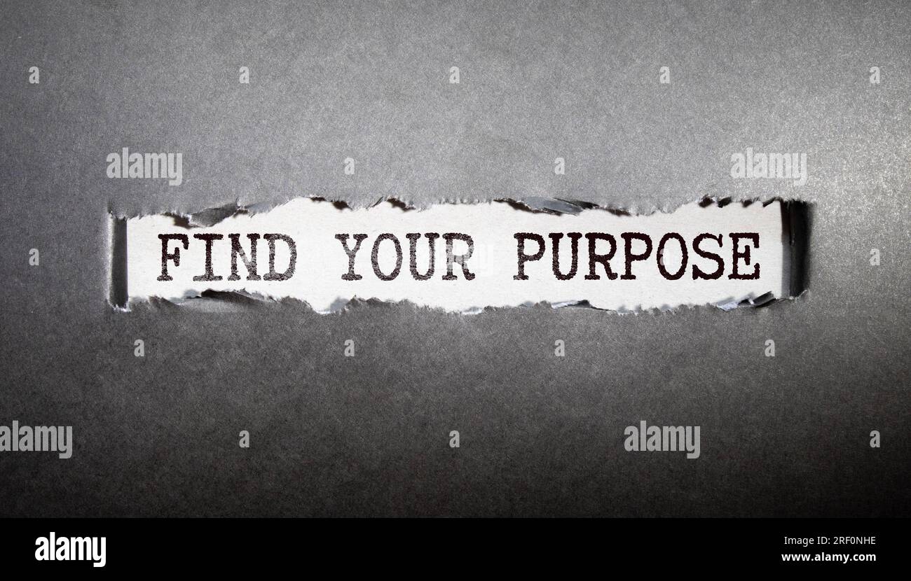 Text DISCOVER YOUR PURPOSE on a Office desk table with keyboard ...