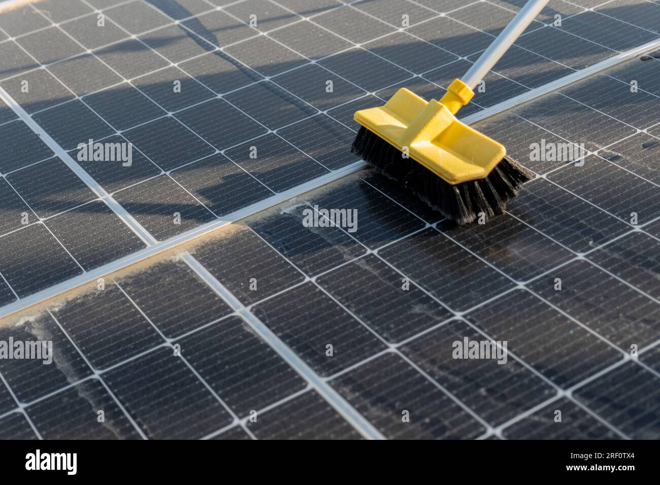 Cleaning solar panels.renewable energy.washing solar panels from dust ...