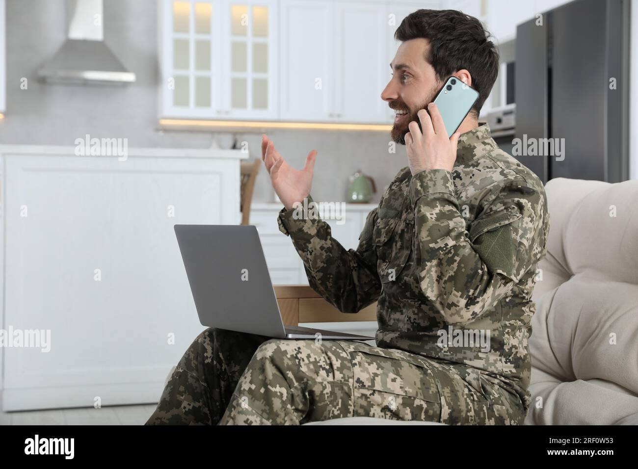 Happy soldier man talking hi-res stock photography and images - Alamy