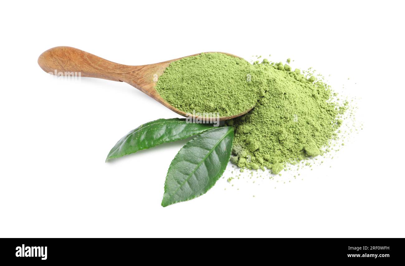 Wooden spoon with green matcha powder and leaves isolated on white ...