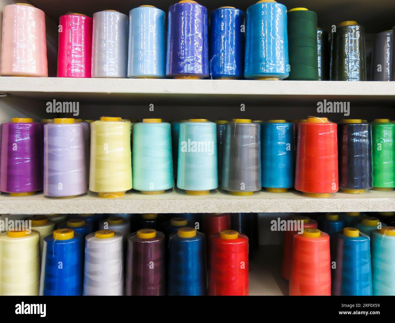 Spools of Sewing Thread on Display in Fabric Center Stock Photo - Alamy