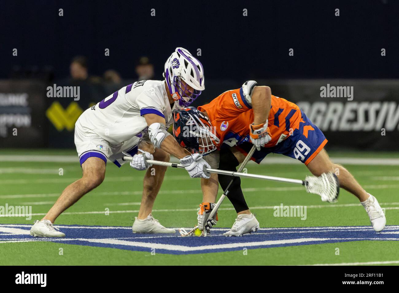 FRISCO, TX - JULY 30: Waterdogs defenseman Eli Gobrecht (25) and ...