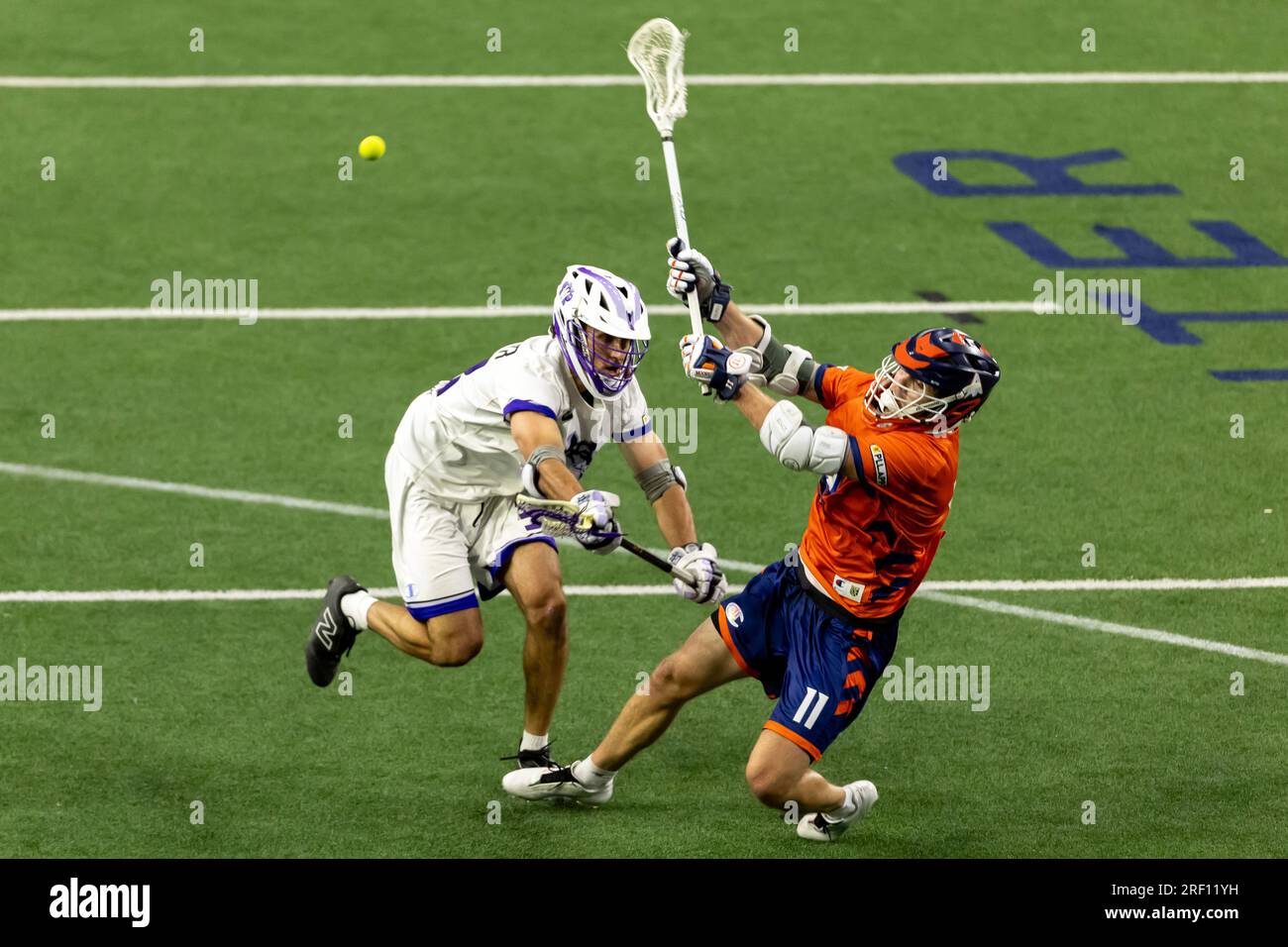 FRISCO, TX - JULY 30: Archers attackman Matt Moore (11) takes a hit ...