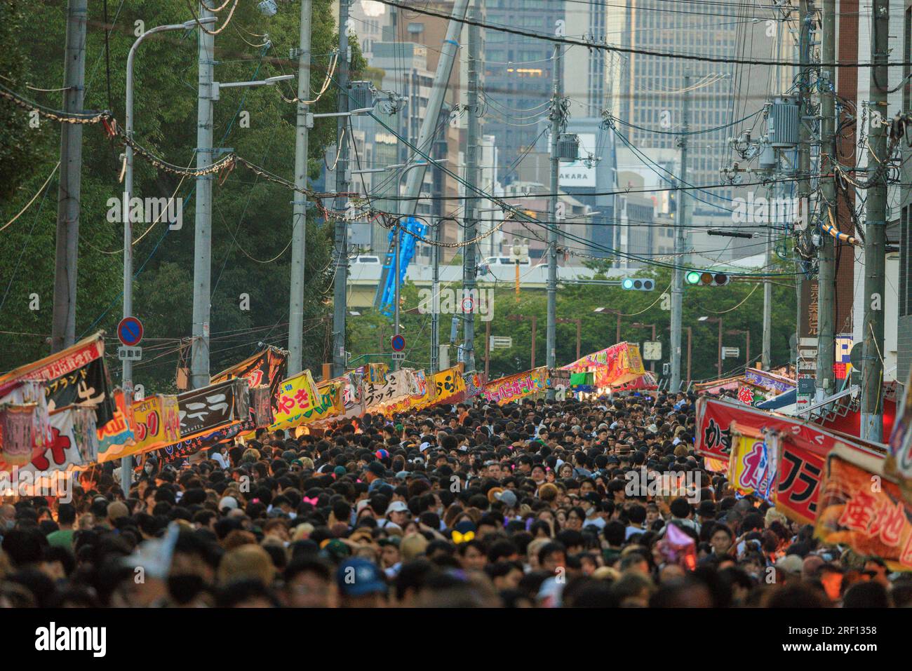 Osaka, Japan - July 25, 2023: Sea of people walk on crowded street at ...