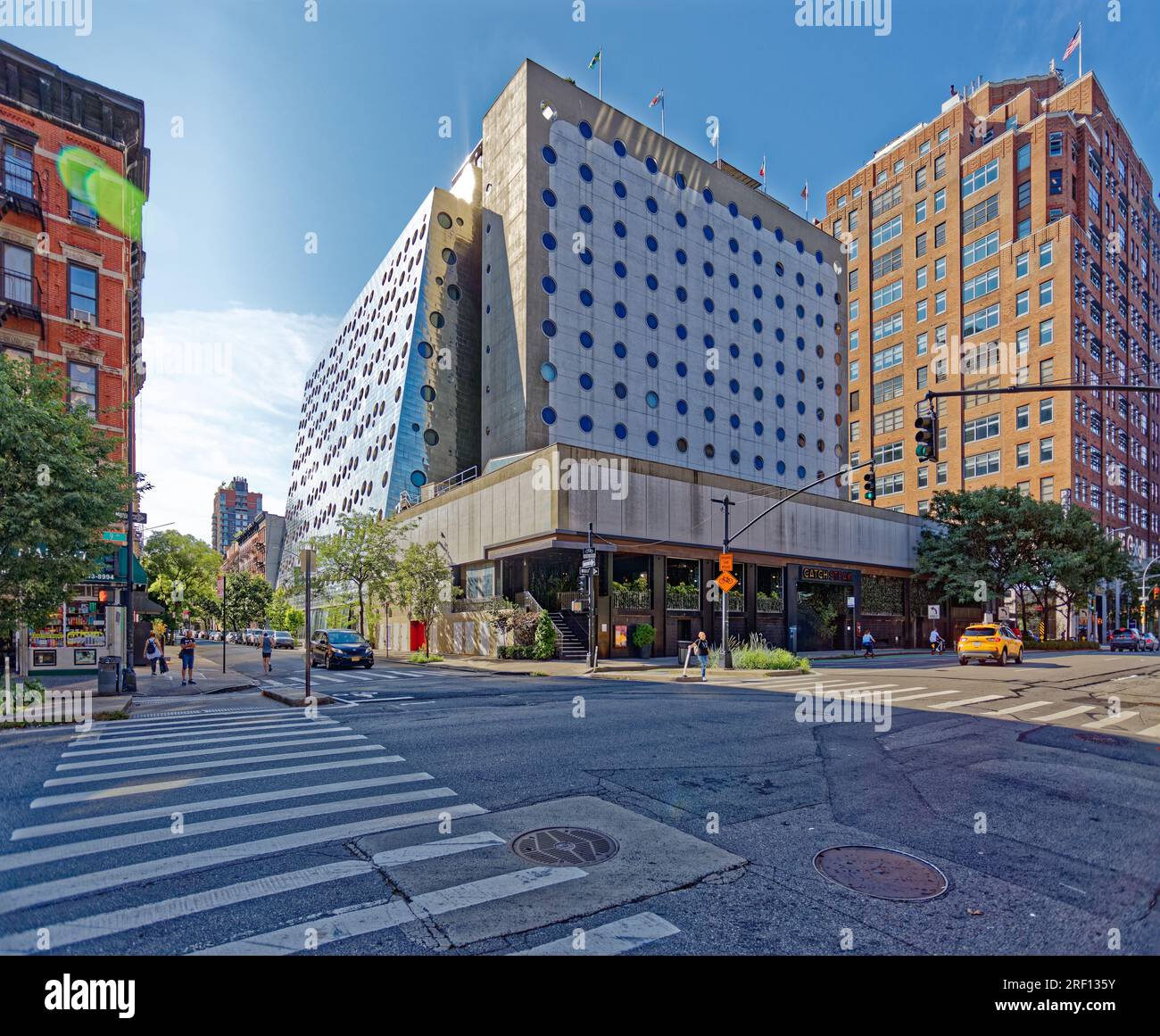 Back-to-back hotels: Steel-clad Dream Downtown Hotel and white tile ...