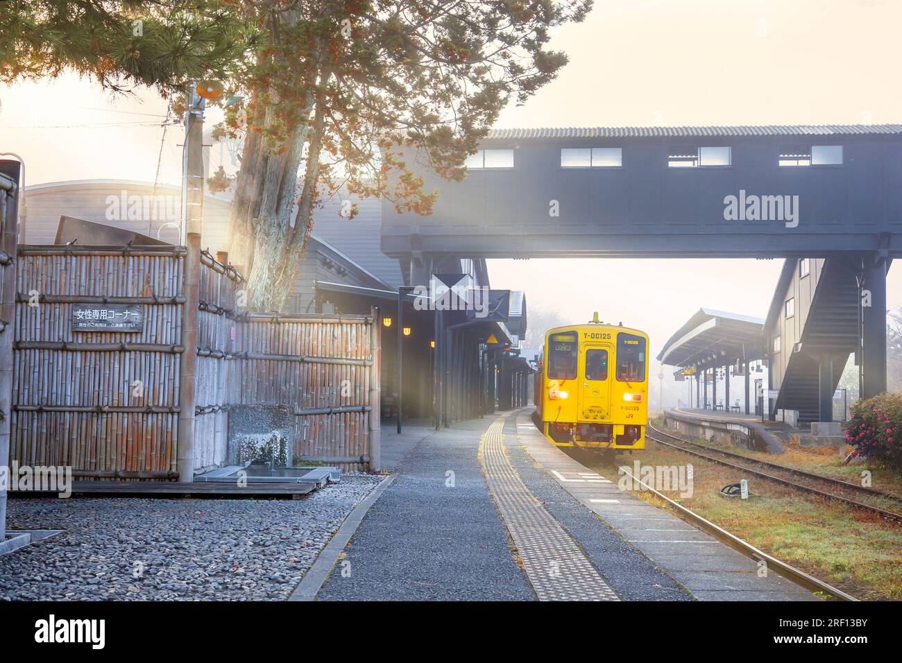 Yufuin, Japan - Nov 27 2022: The "Yellow One Man Diesel Car" (Kiha Y ...