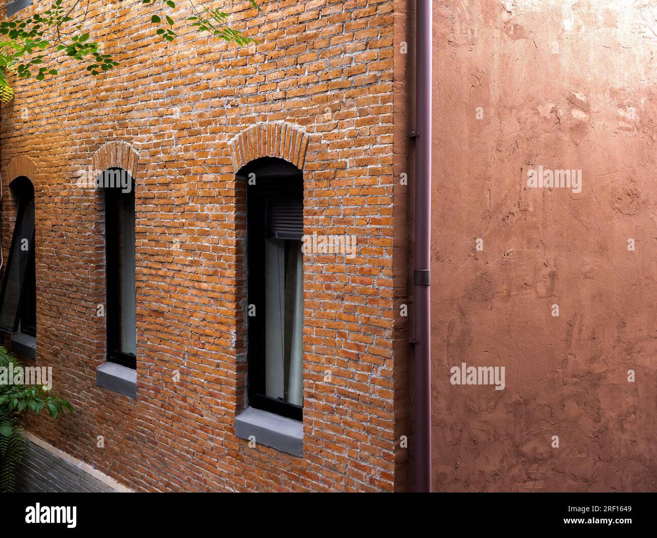 Beautiful vintage red bricks building exterior design, decorated with ...