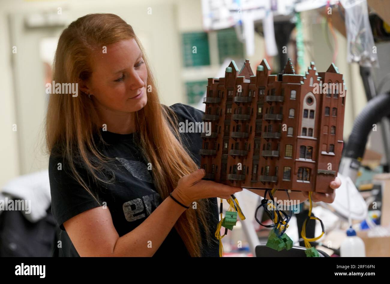 Hamburg, Germany. 18th July, 2023. Model maker Tanja Schlabitz looks at ...