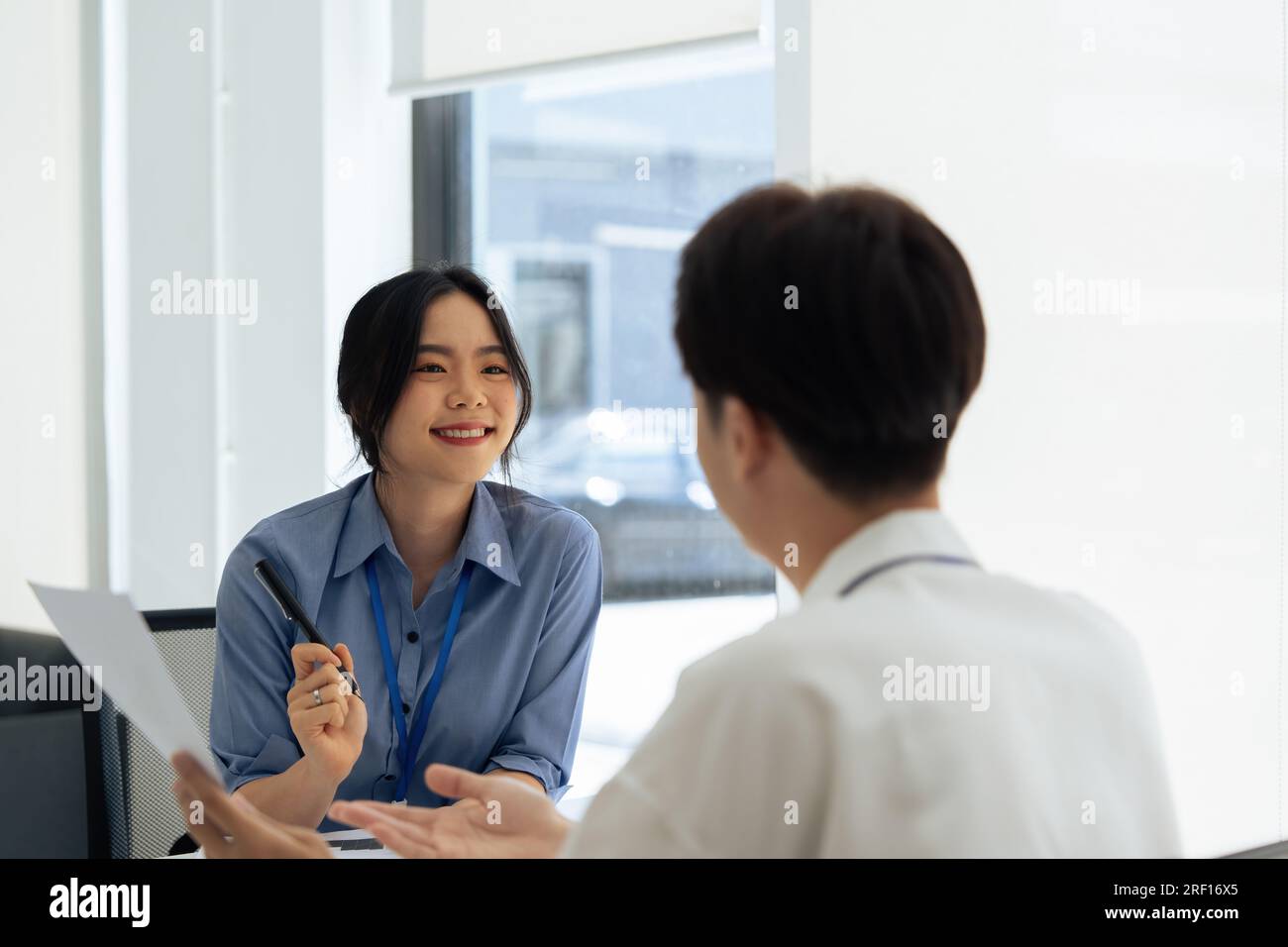 Businesspeople Interviewing Job Candidate In Office. job interview ...