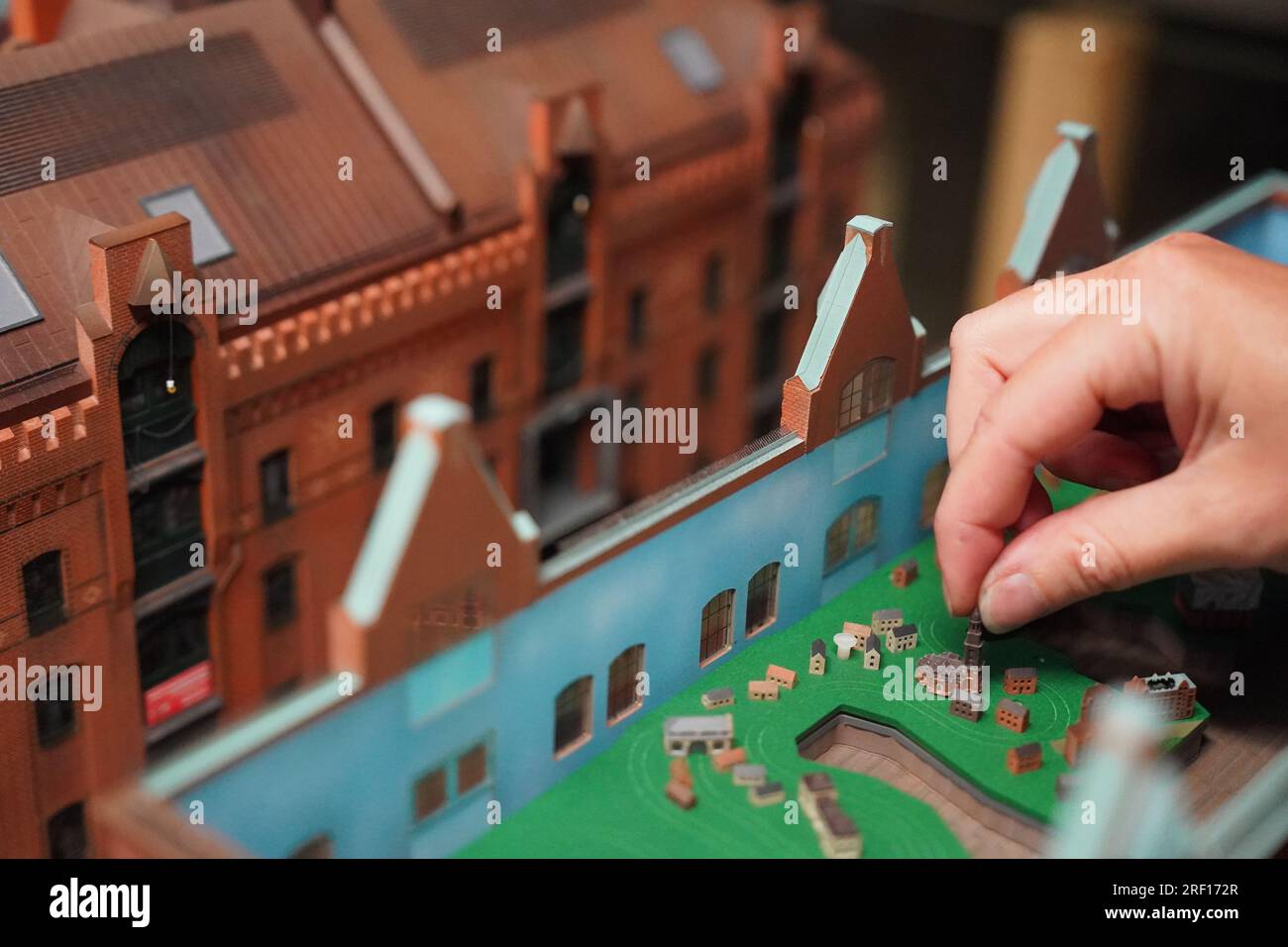 Hamburg, Germany. 18th July, 2023. Model maker Tanja Schlabitz works in ...