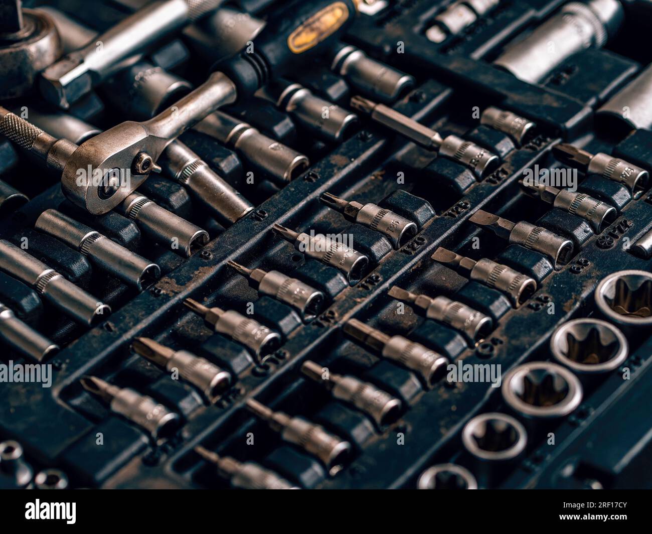 Set of nozzles and heads for rotary key. View of metalwork tool in case ...