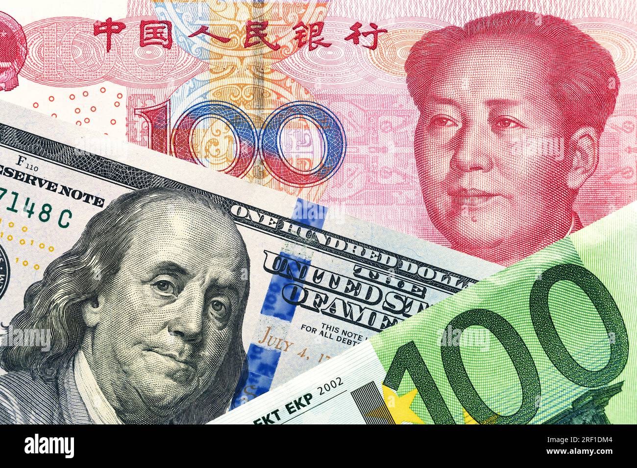 US Dollar, Euro and Yuan currency banknotes. economical war concept ...