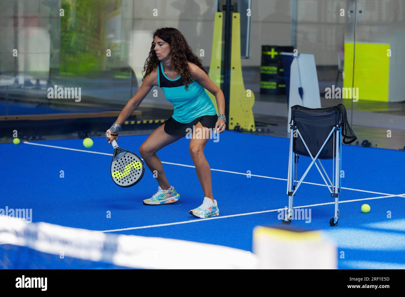 Padel Instructor Teaching the Game Techniques Stock Photo - Alamy