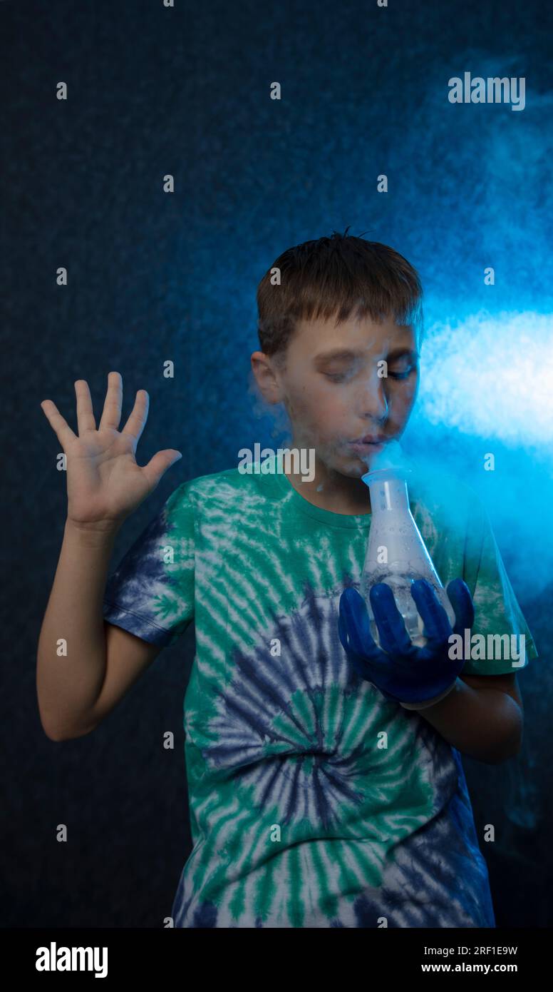 New scientific discoveries. Smart boy scientist screaming in surprise ...