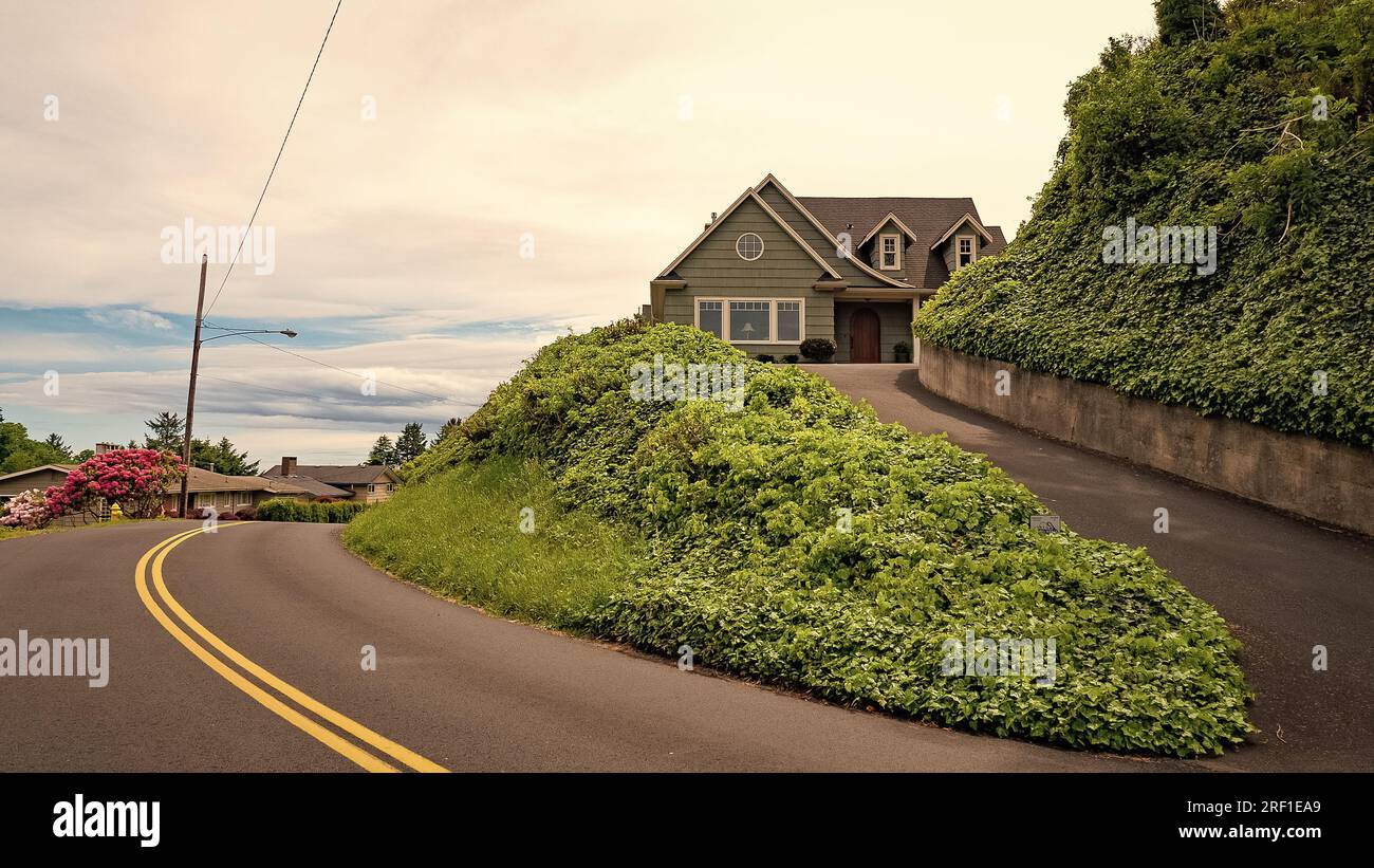 Mansion house on road turn. House with yard in suburbs. Suburban house ...