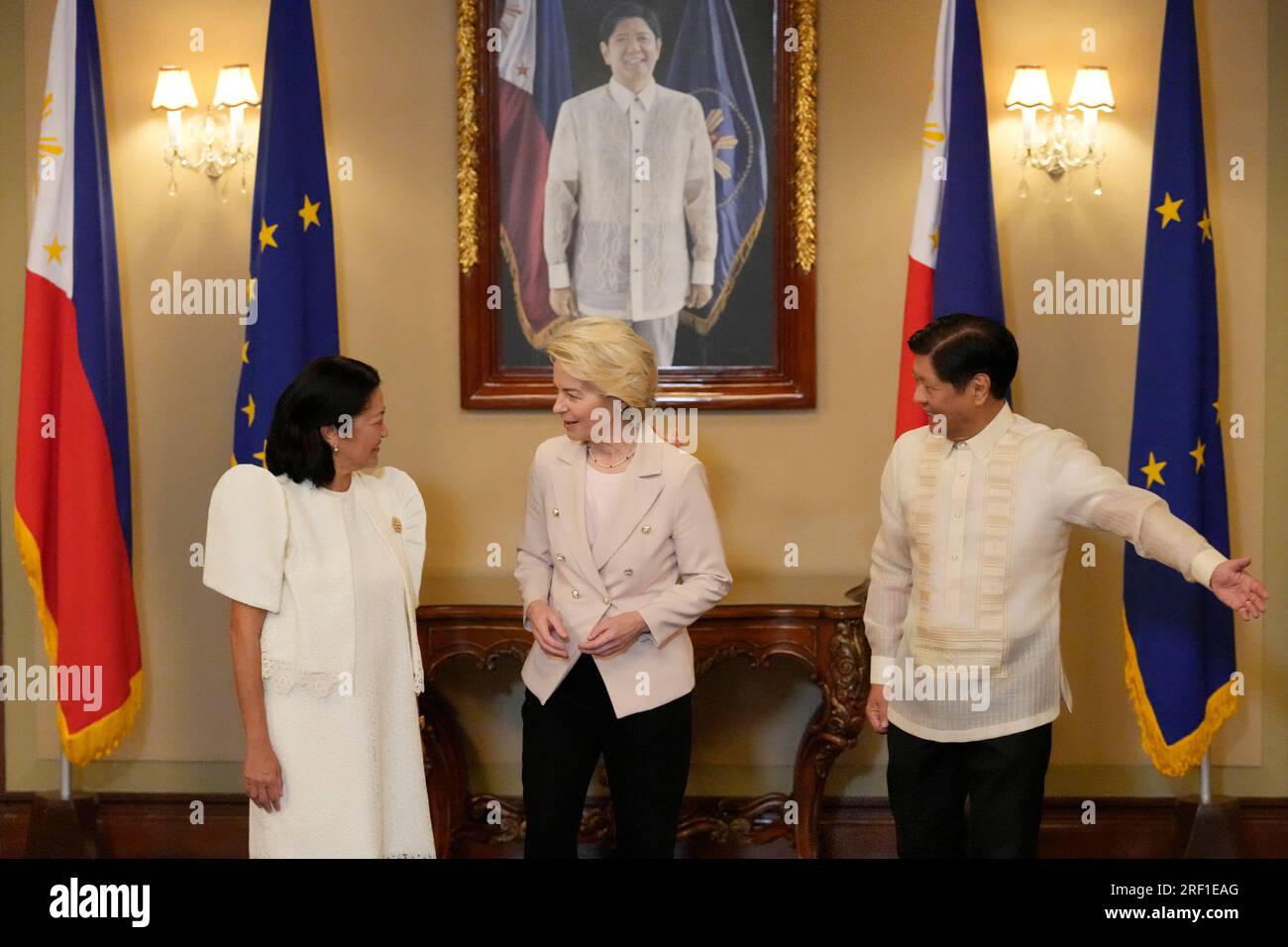 Philippine President Ferdinand Marcos Jr., right, gestures while ...