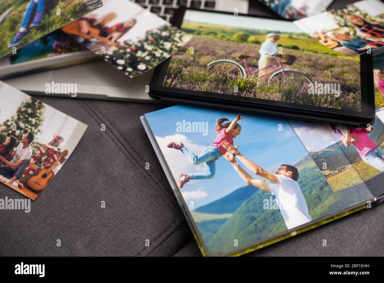 Laptop with photo, photoalbum, album Stock Photo - Alamy