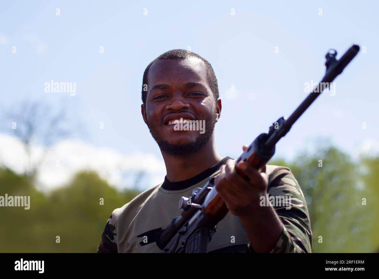 Holding a sniper rifle hi-res stock photography and images - Alamy