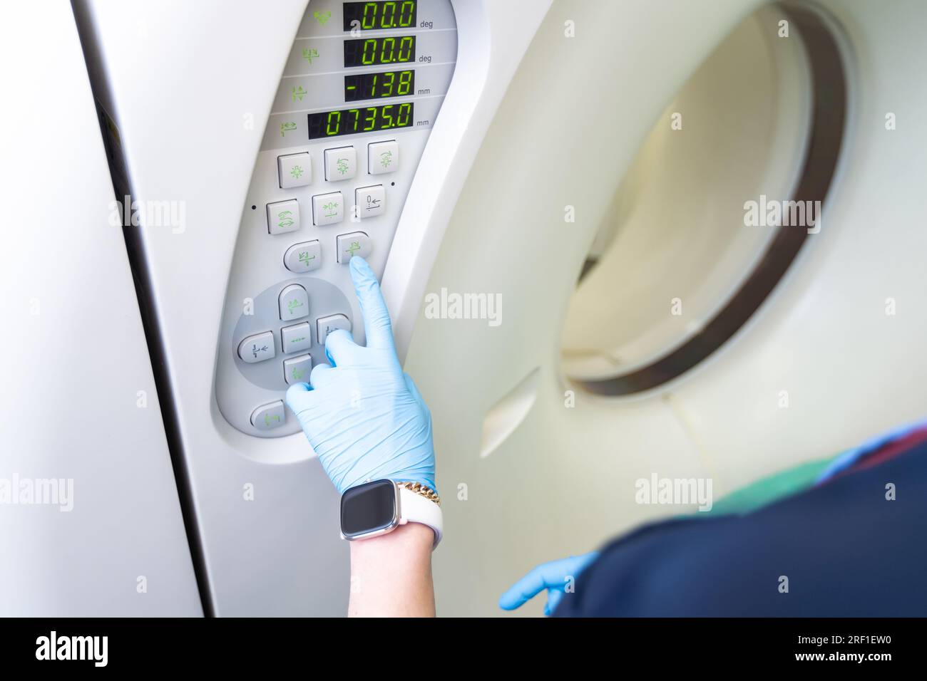 hand of doctor operating Computed Tomography device Stock Photo - Alamy