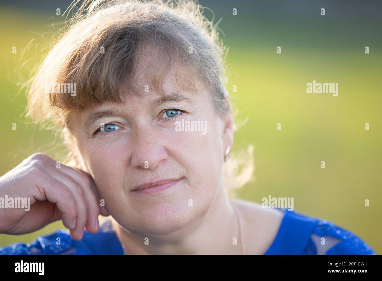 Photographing ordinary elderly people. Close-up portrait of an elderly ...