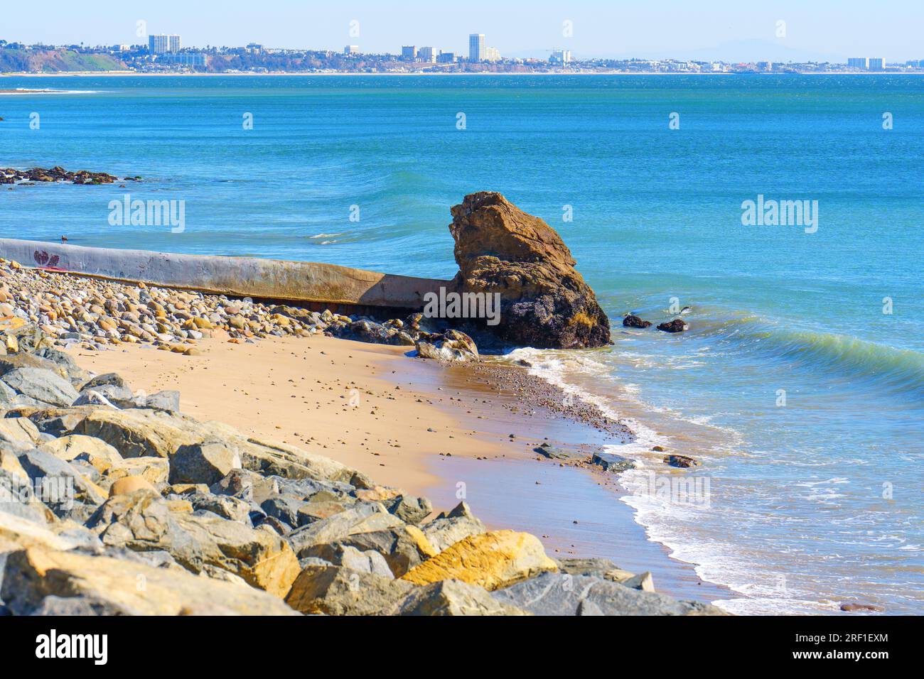 Coastal landscape view from the sandy shores onto the vast expanse of ...