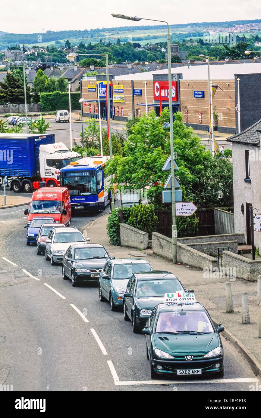 Car queue in a city street Scotland Stock Photo - Alamy