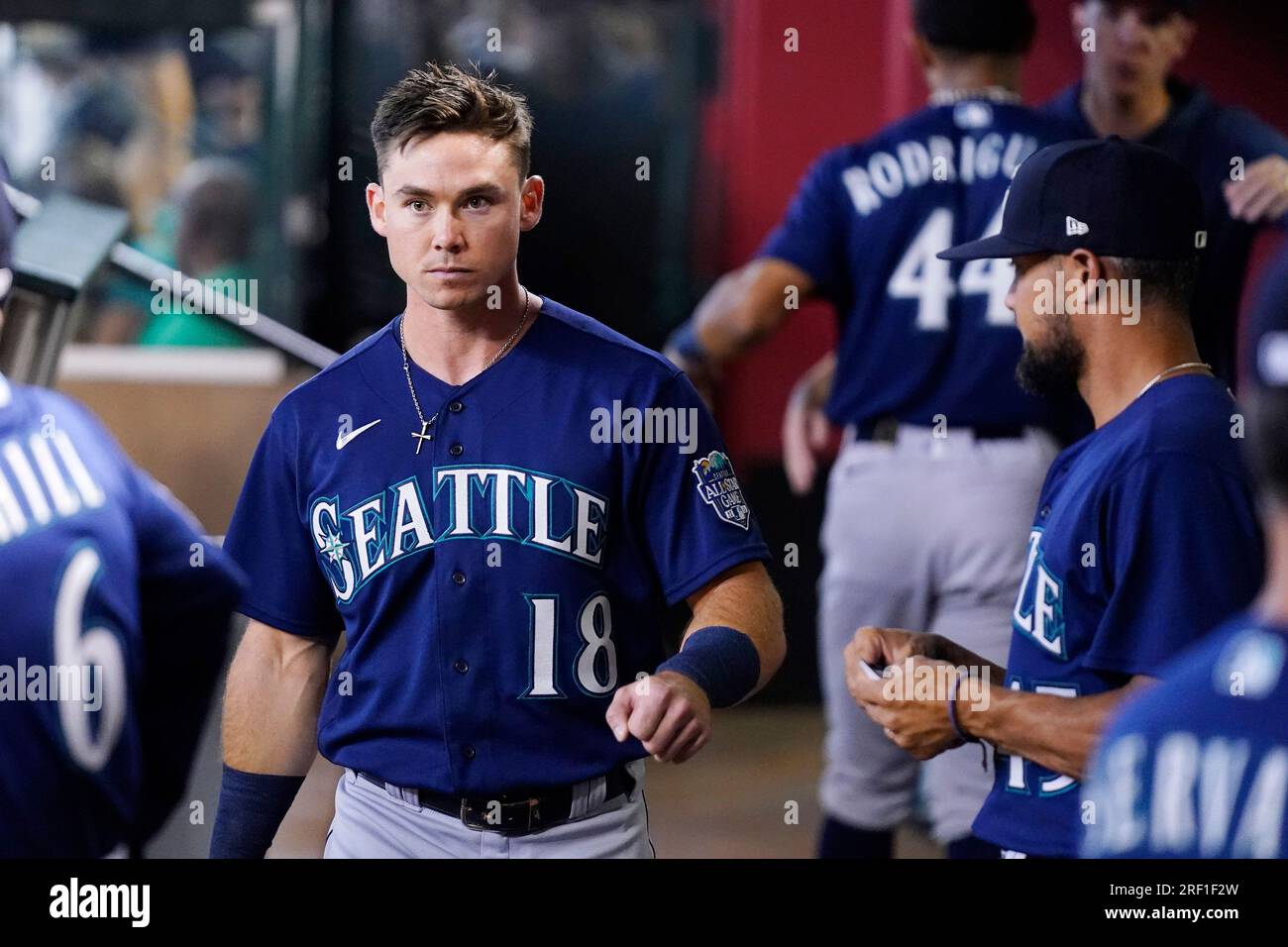 Seattle Mariners left fielder Cade Marlowe walks through the dugout prior to a baseball game ...