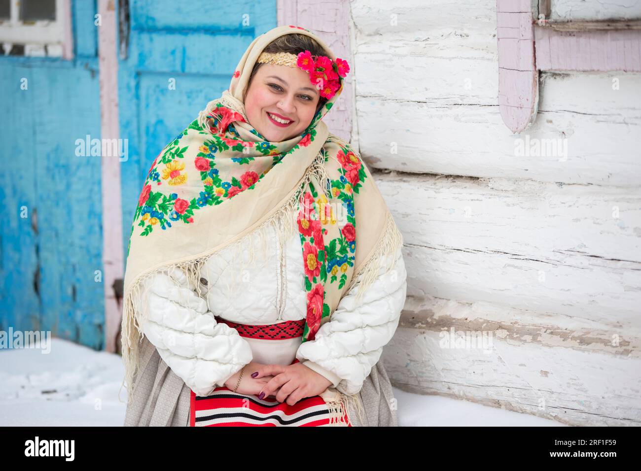 .Portrait of a beautiful girl in a Russian headscarf. Young woman ...